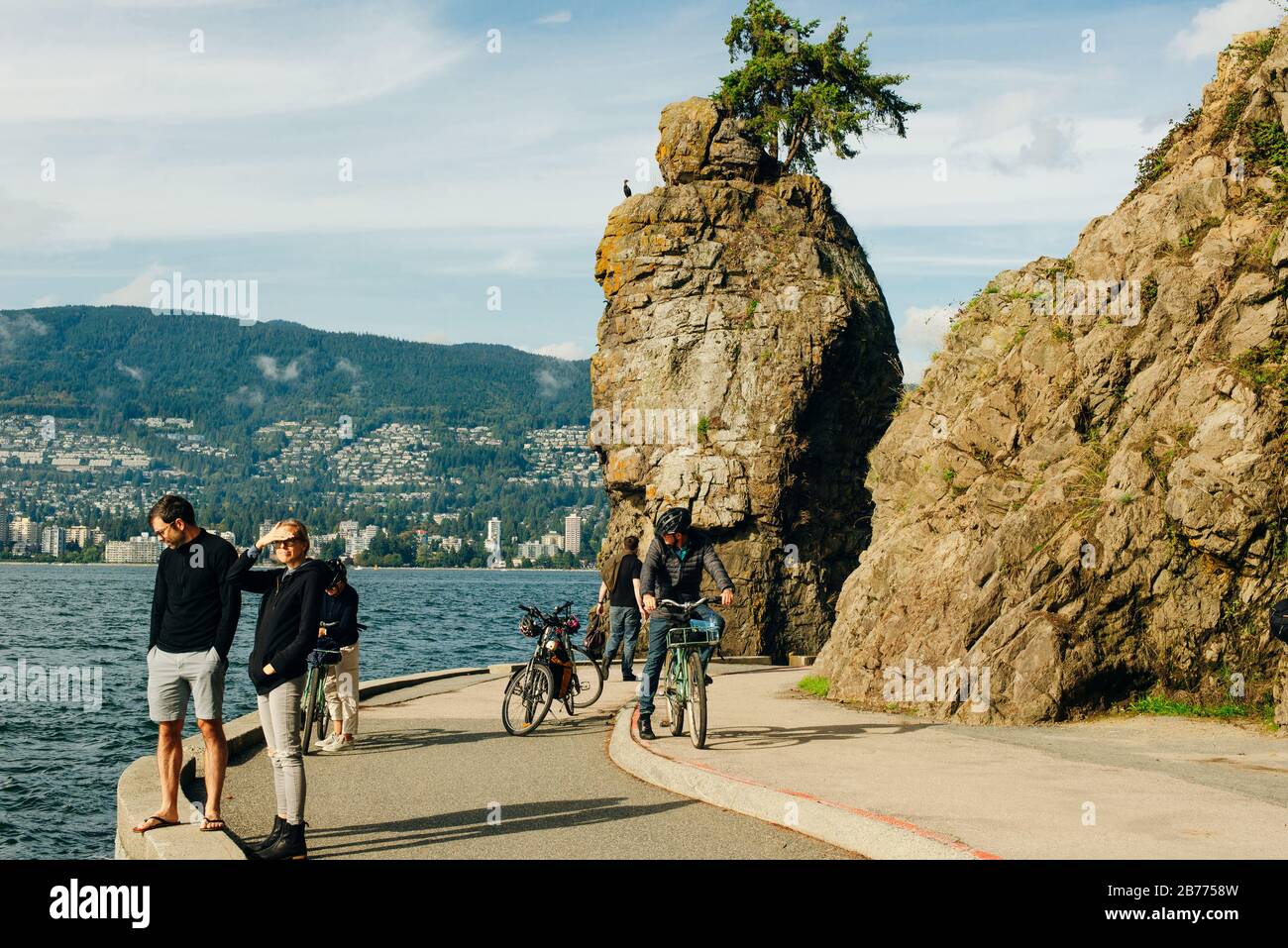 Siwash Rock, a famous rock outcropping in Vancouver, British Columbia ...