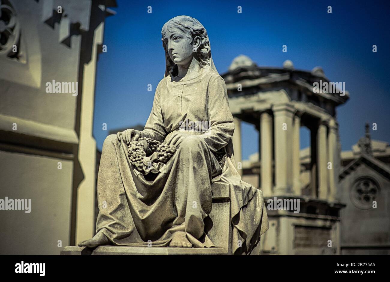 Marble statue of a girl sitting during daytime Stock Photo - Alamy