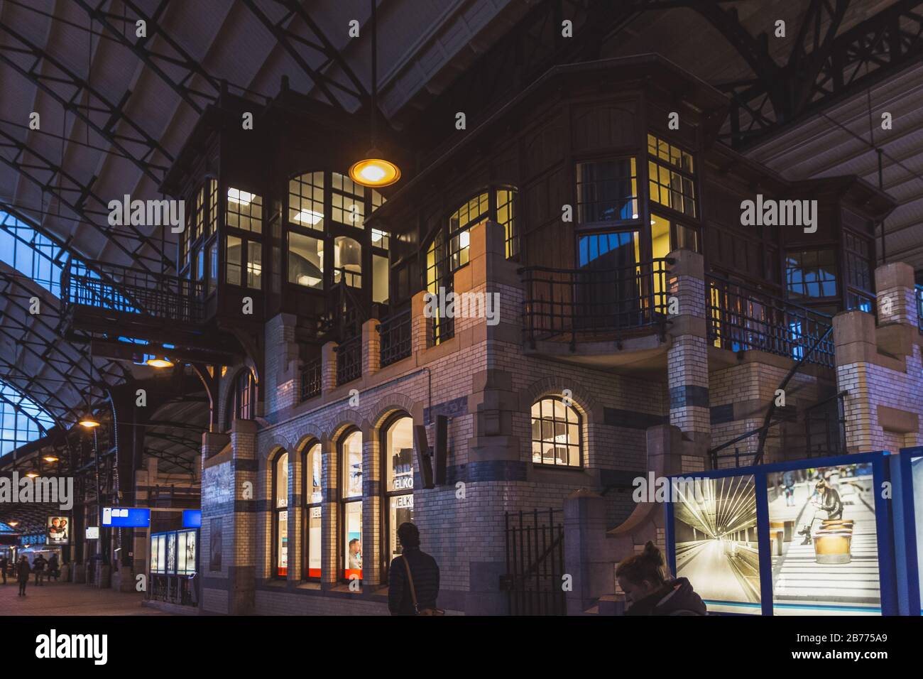 Cool building with windows and lights at night Stock Photo - Alamy