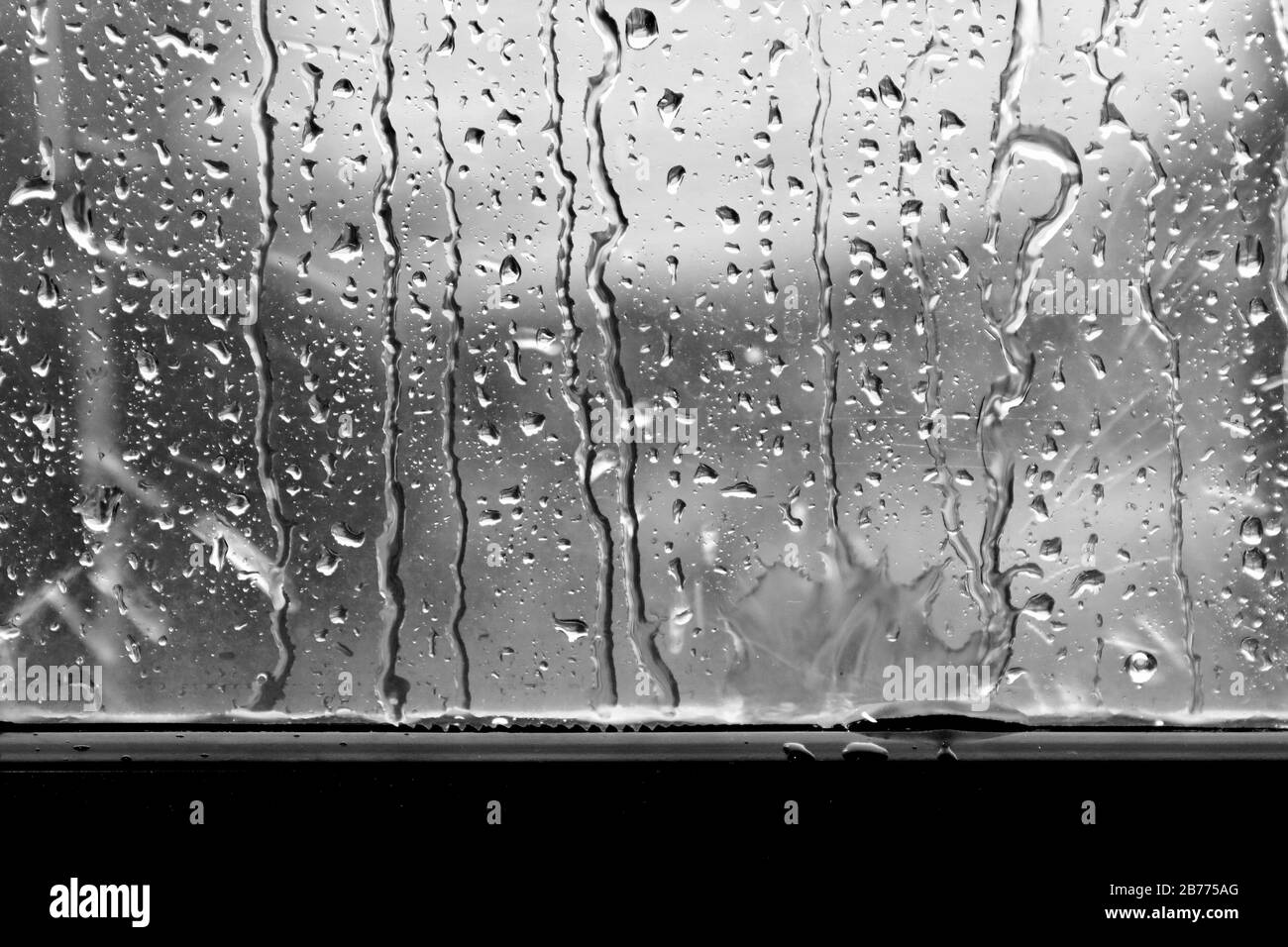 background dark raindrop on window glass gray Stock Photo - Alamy