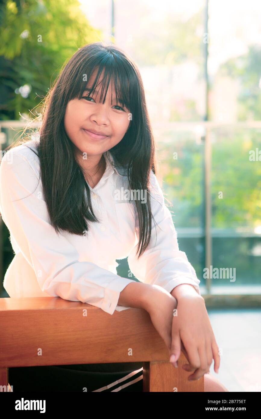 portrait smiling face of asian teenager relaxing outdoor Stock Photo ...
