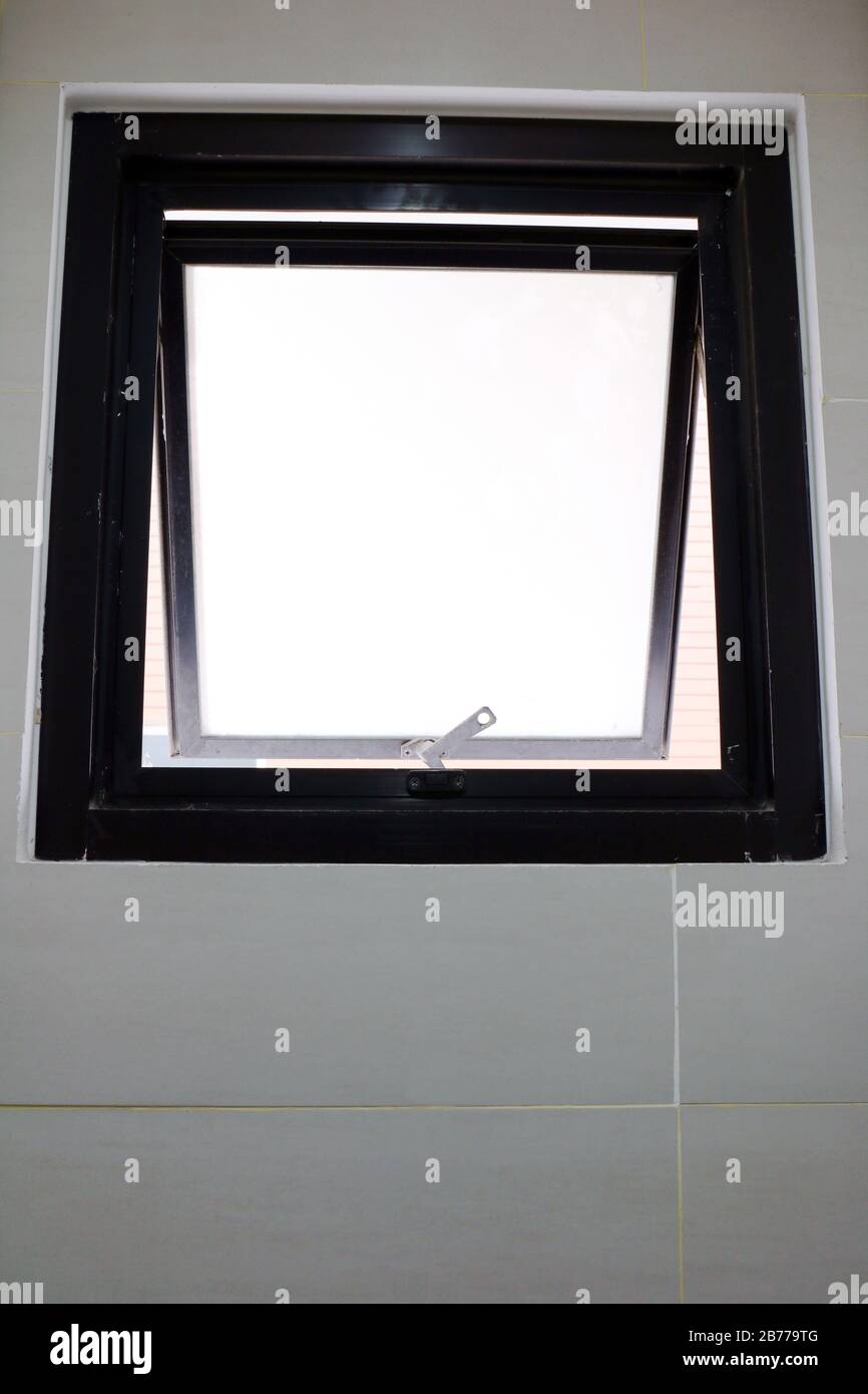 window old open of detention center on wall Stock Photo - Alamy