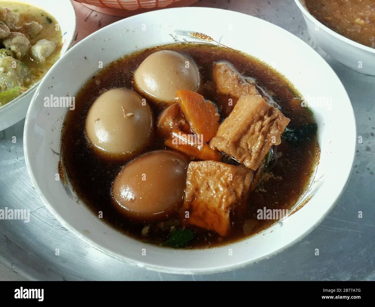 Tom kai Palo (thai word) Boiled egg stewed in bow, asia food ...