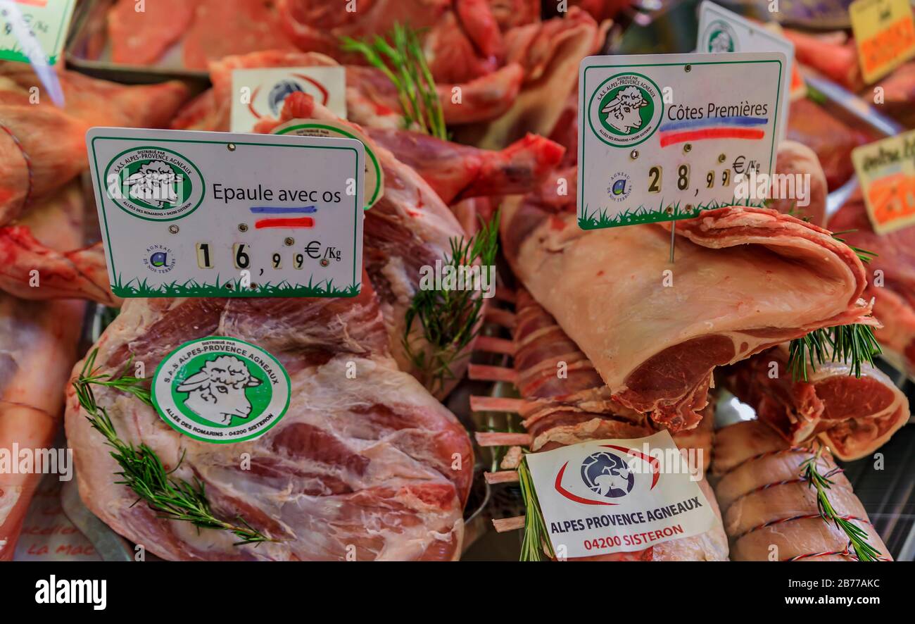Nice, France - June 2, 2019: Counter of a typical French butcher's shop ...