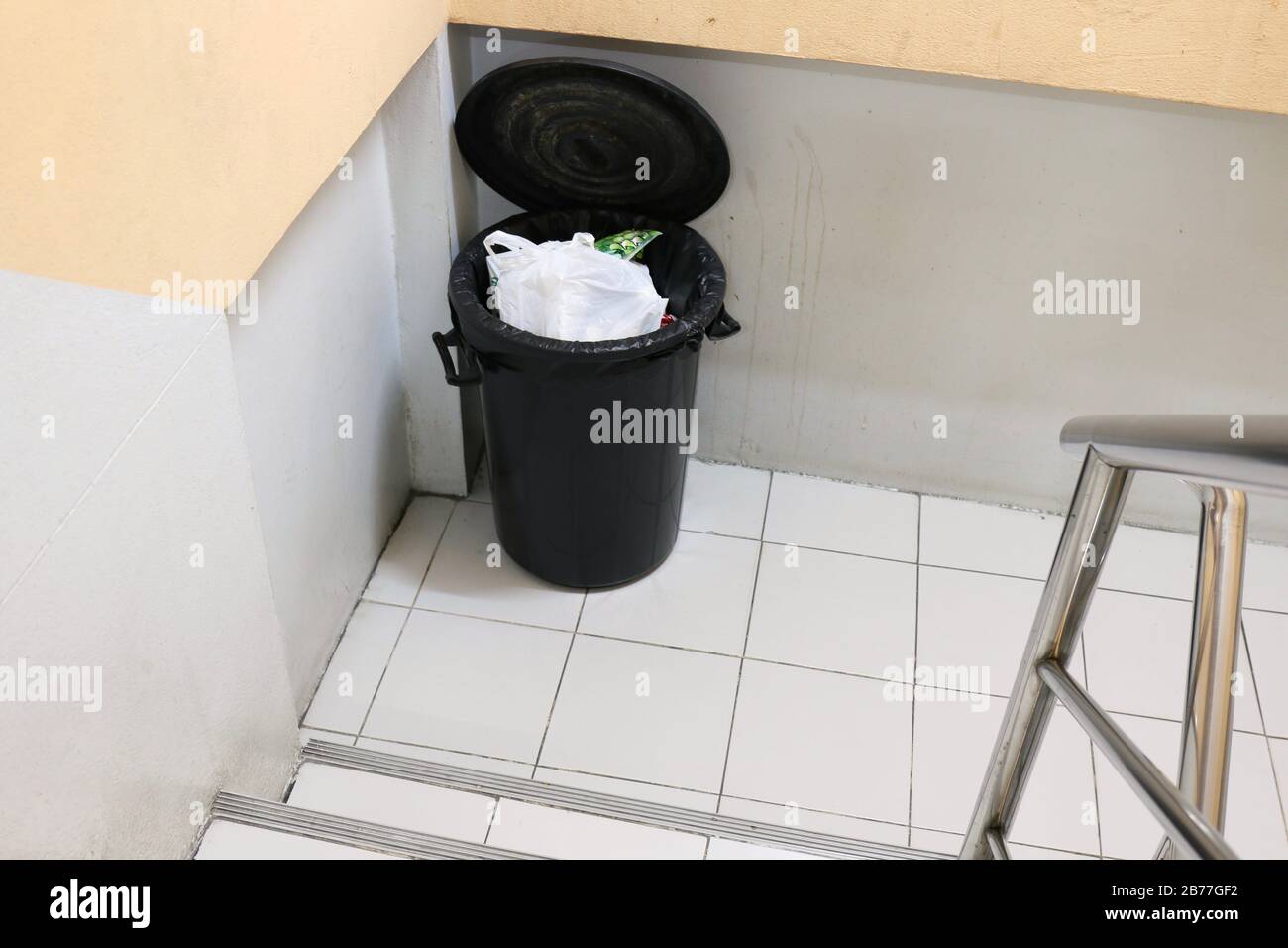 Bin Garbage or Trash on sidewalks staircase side in apartment Stock ...