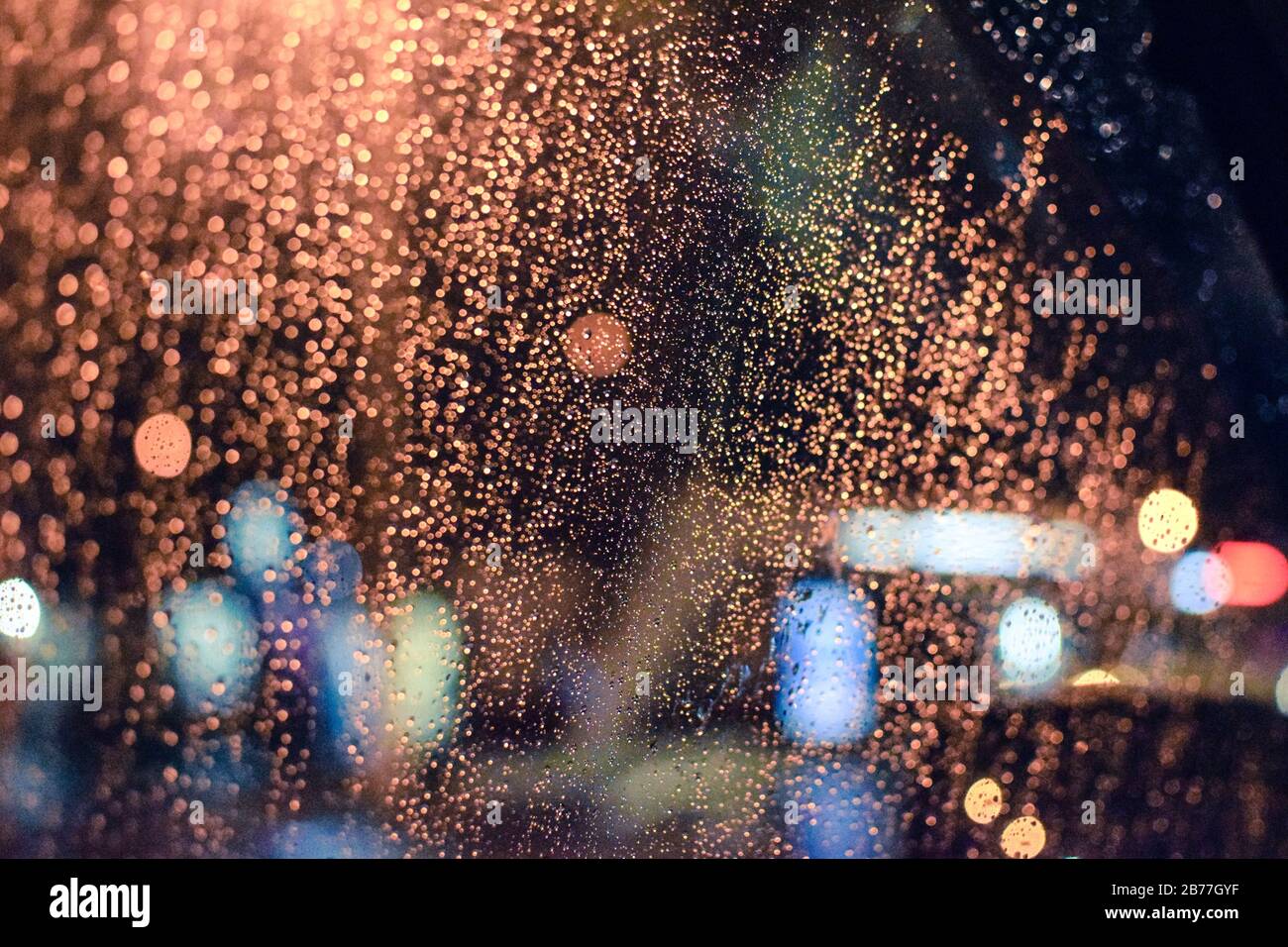 Abstract background from water drops on glass Stock Photo - Alamy