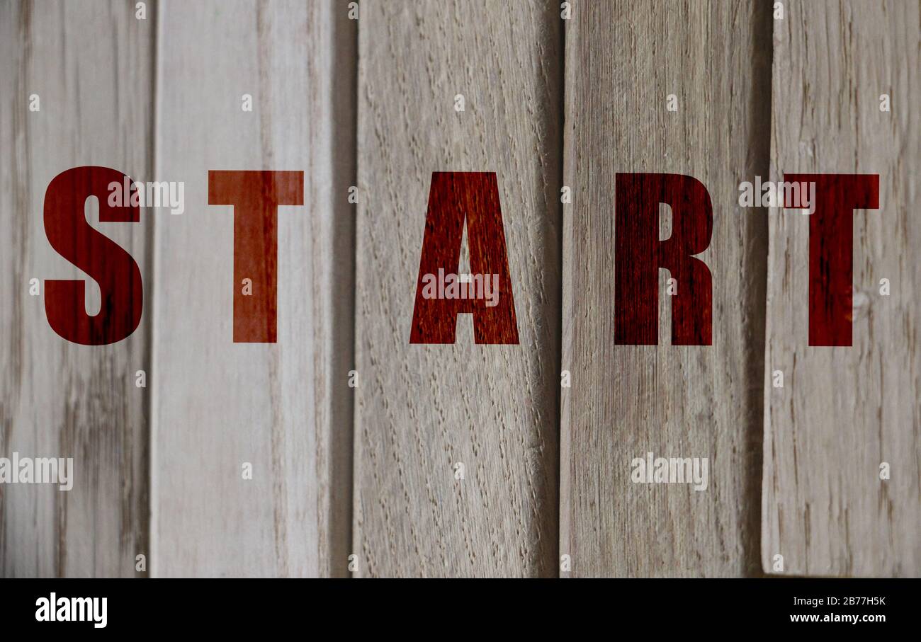 Start word concept dark red letters on wooden background Stock Photo ...