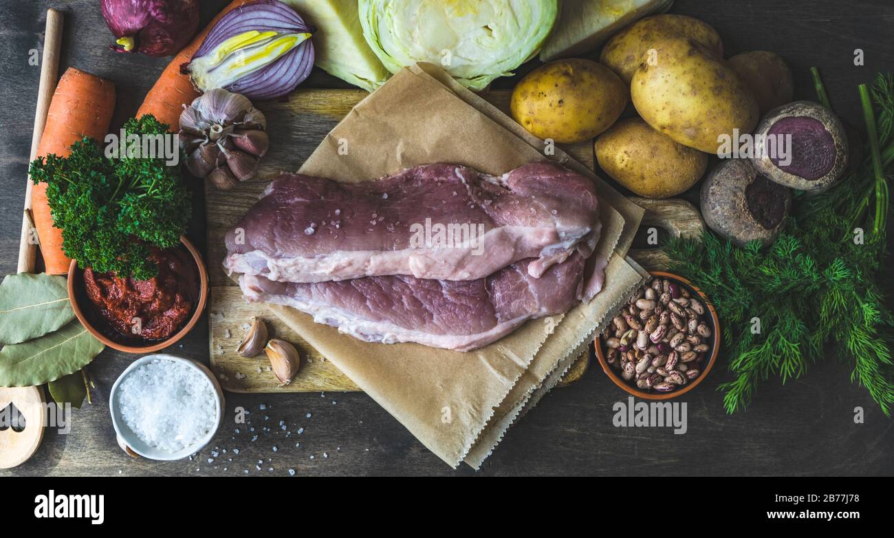 Borscht cooking concept with fresh ingredients on wooden table with ...