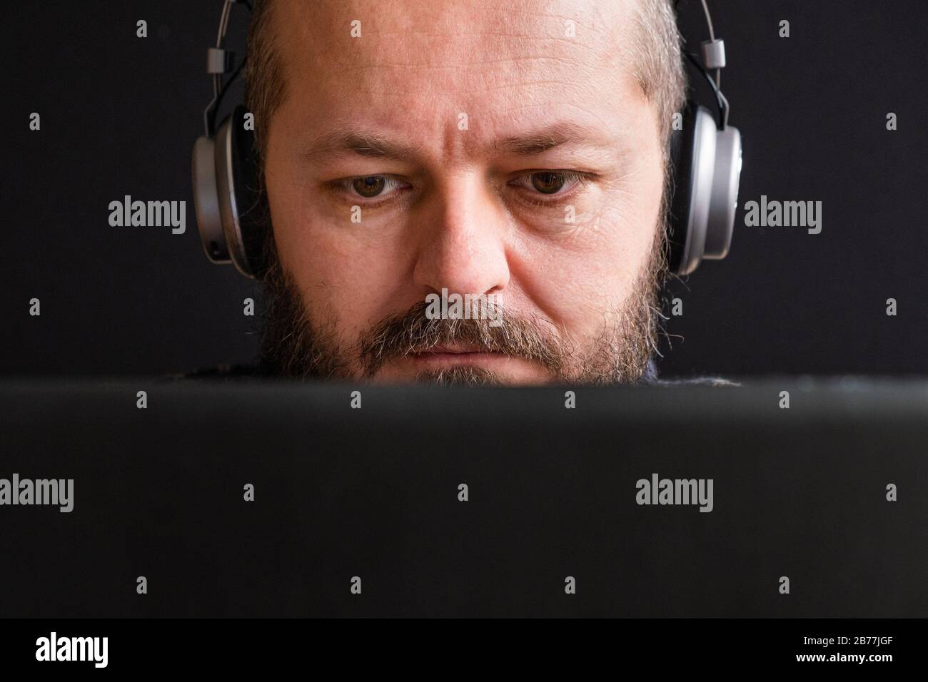 Angry man behind screen hi-res stock photography and images - Alamy