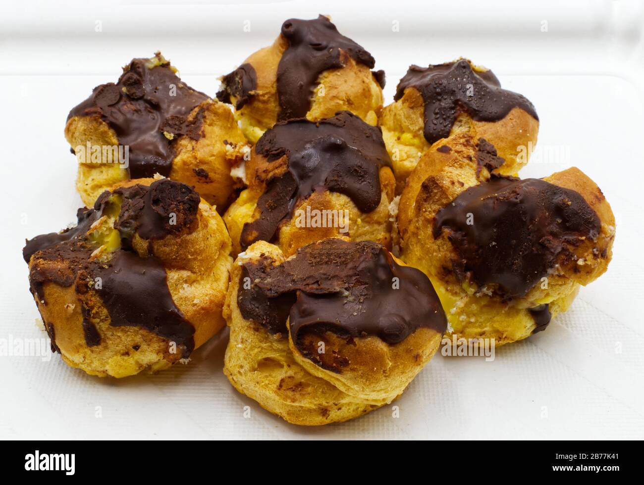 Chocolate Profiterole isolated on white background. Sweet chocolate ...
