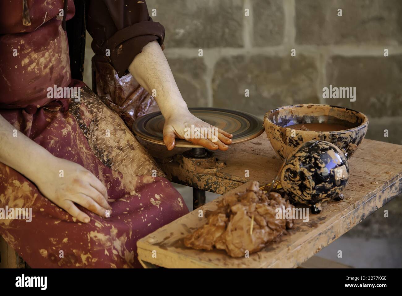 Potter shaping clay, craft detail Stock Photo - Alamy