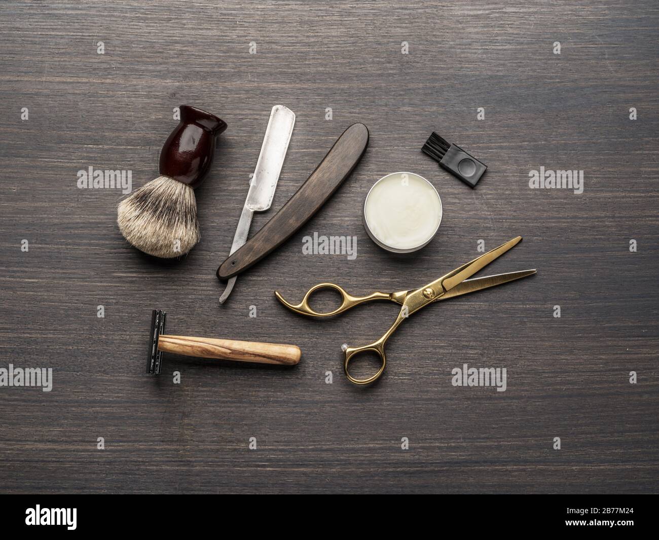Classic grooming and hairdressing tools on wooden background. Top view ...
