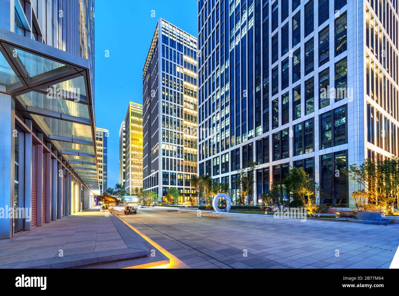 City square and modern high-rise buildings, night view of Jinan, China ...