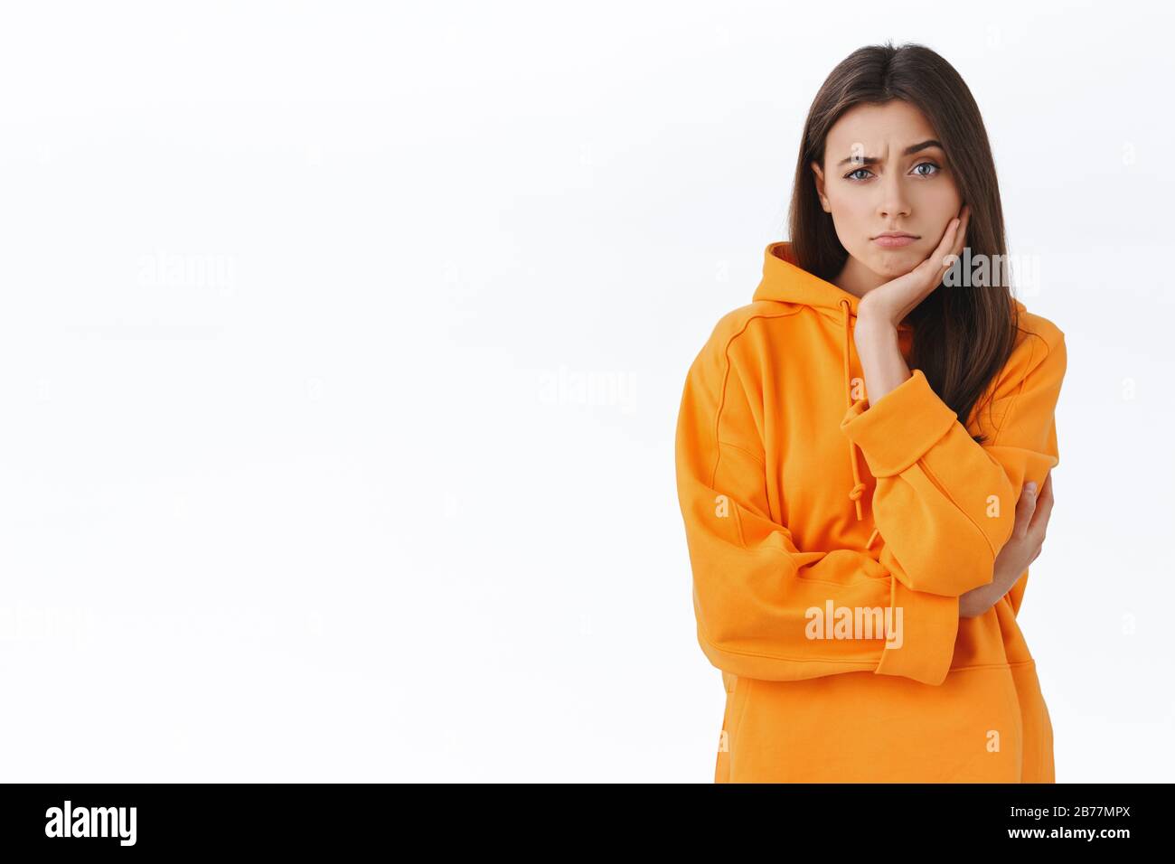 Skeptical And Unamused Brunette Girl Hear Friends Suggestion Looking Judgemental And Doubtful