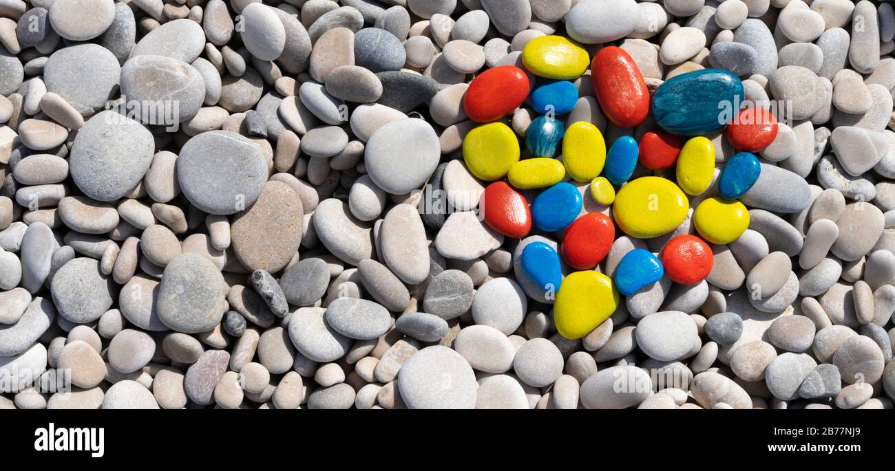 World autism awareness day. Top view to white beach stones with ...