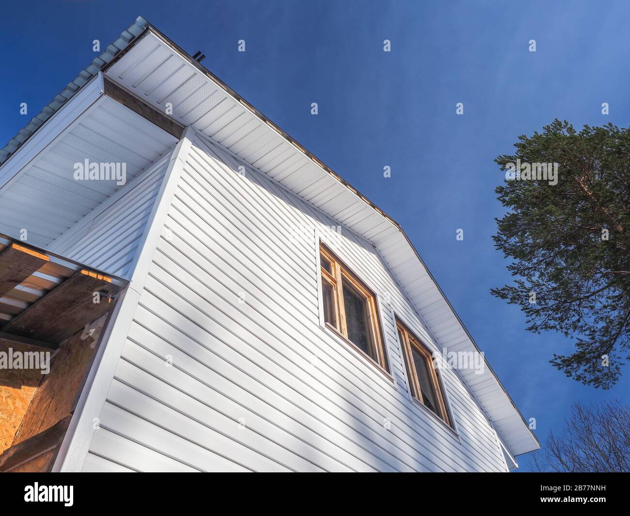 frame house and white siding Stock Photo - Alamy