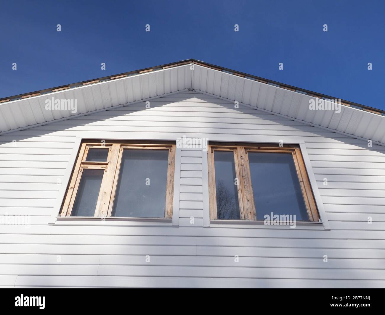 frame house and white siding Stock Photo - Alamy
