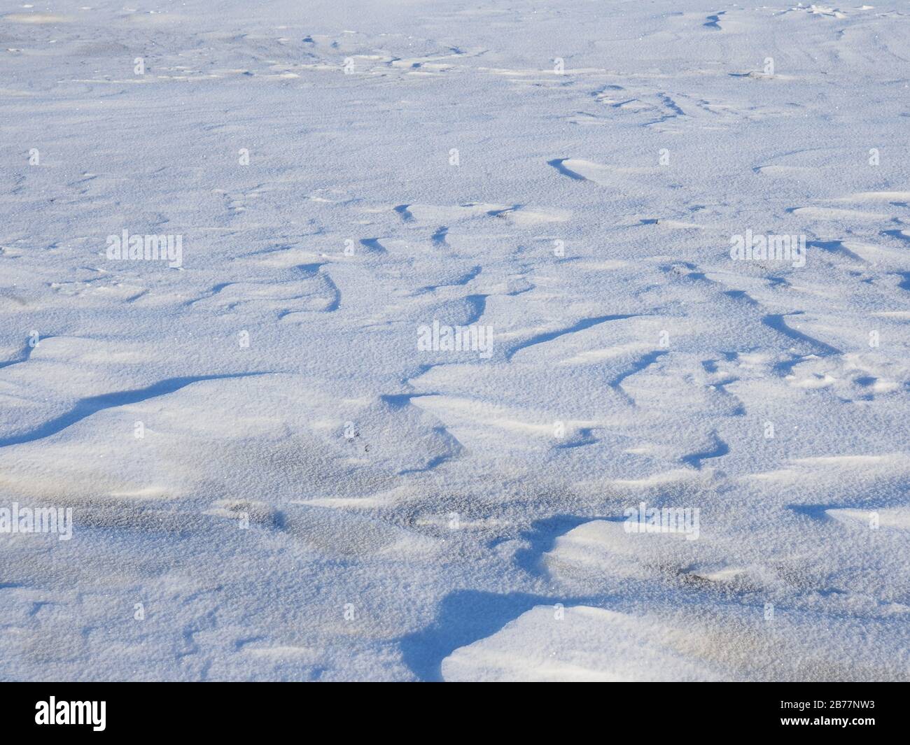 White snow and clear ice. Background Stock Photo - Alamy
