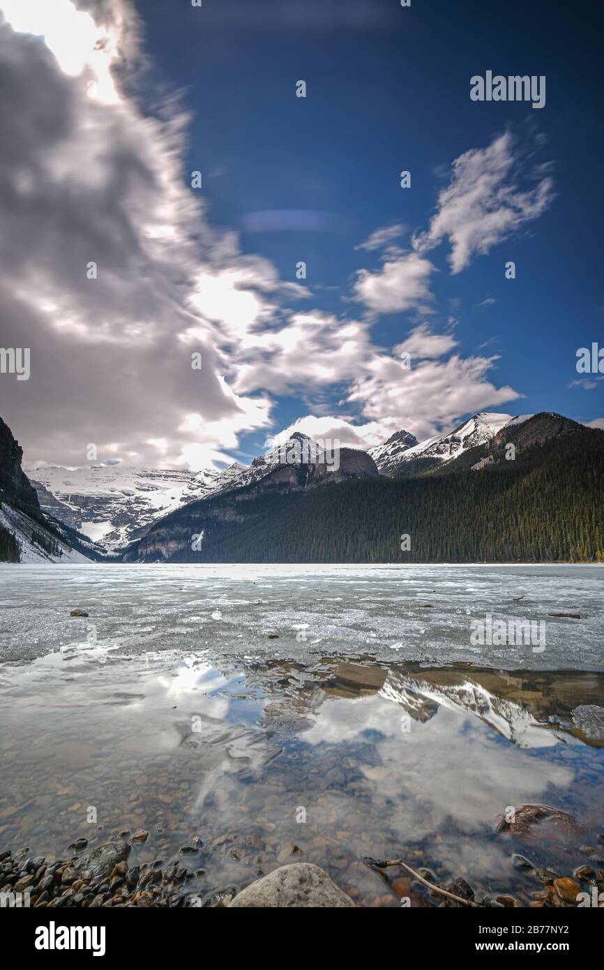 Mount fairview, partly frozen lake, Lake Louise Banff National Park ...