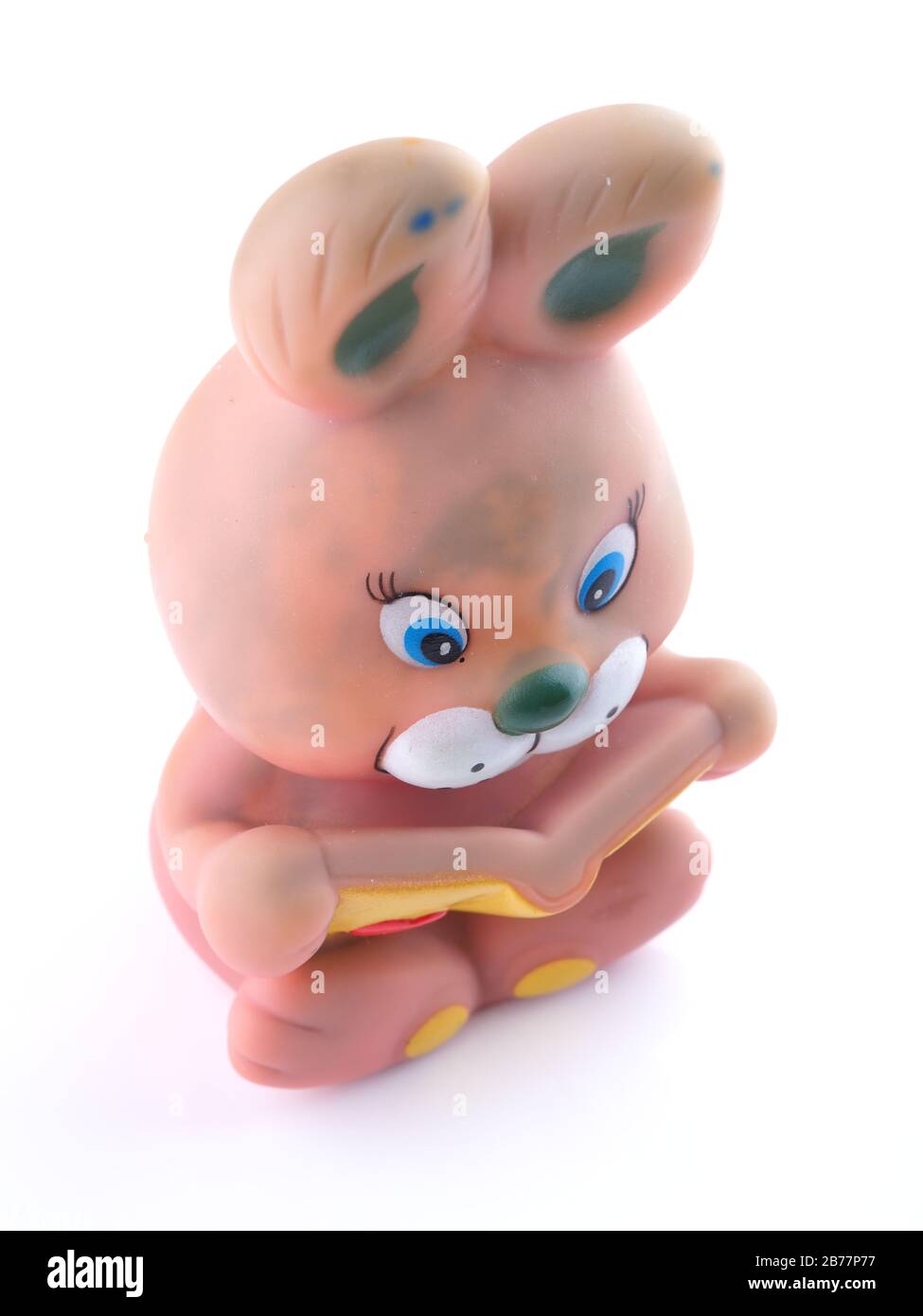 rubber rabbit on a white background Stock Photo - Alamy