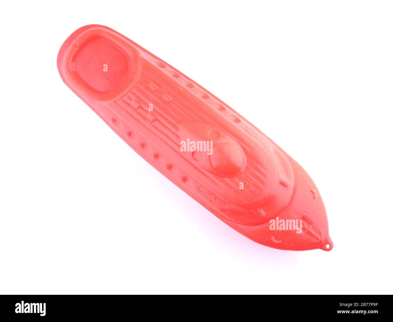 red plastic boat on a white background Stock Photo - Alamy