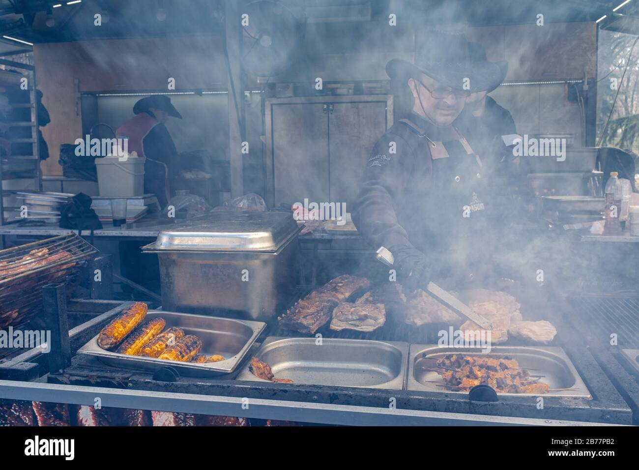 Outdoor kitchen grilling and bbqing at international winter festival ...