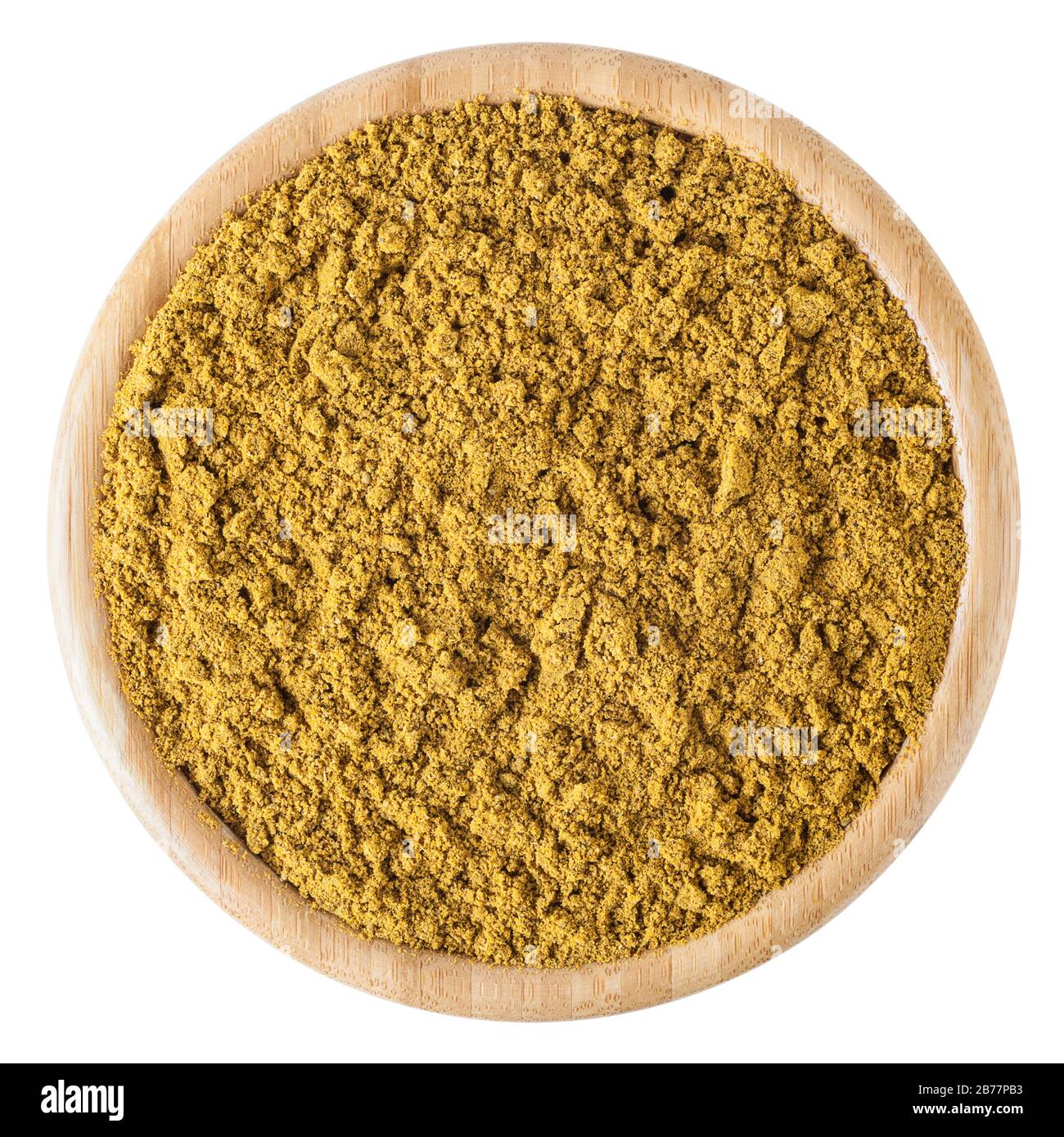 Curry powder in wooden bowl isolated on white background with clipping ...