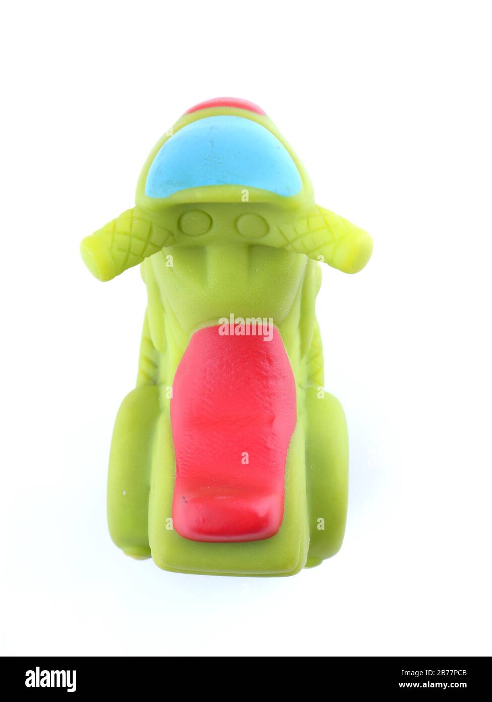 green rubber motorcycle toy on a white background Stock Photo - Alamy