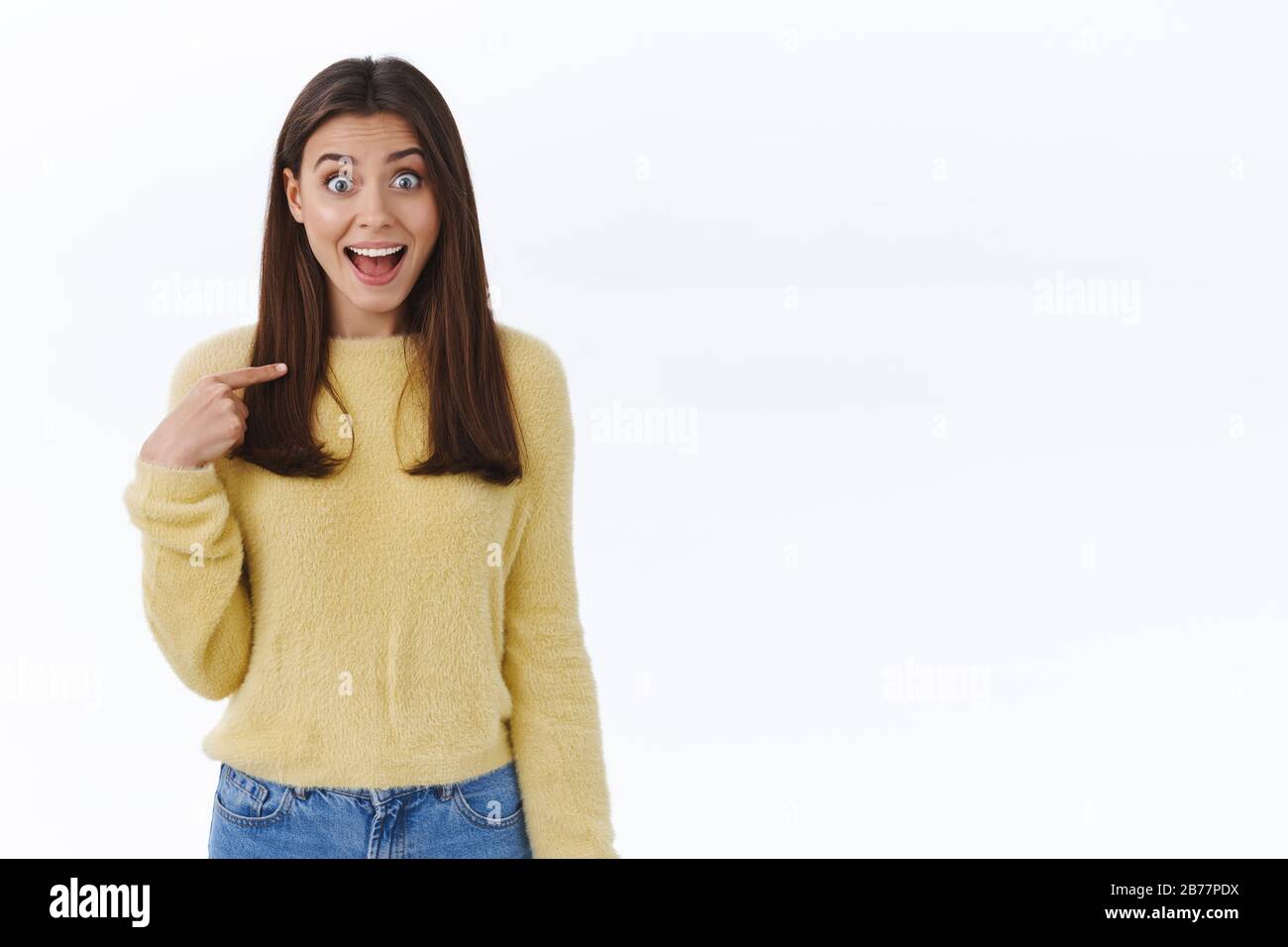 Lucky winner looking surprised and pointing herself as cant believe she ...