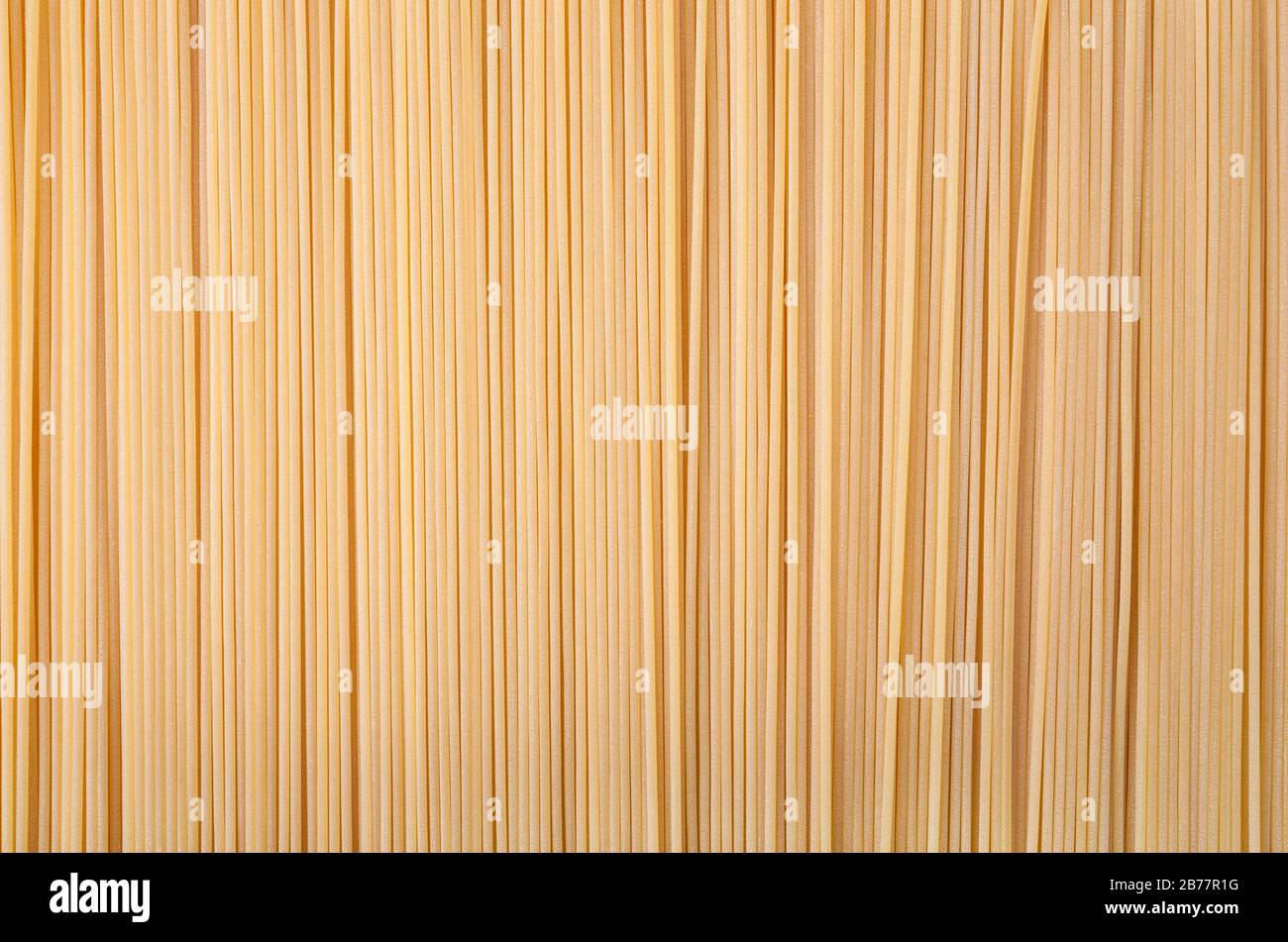 Dried spaghetti background Stock Photo - Alamy