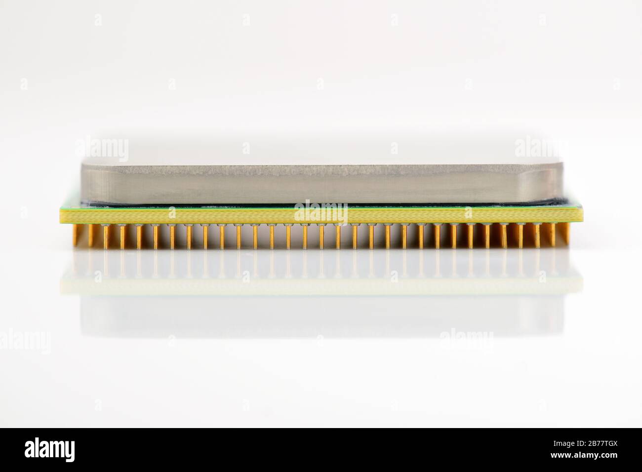 CPU - central processor unit. Golden pins of a core. Copy space ...