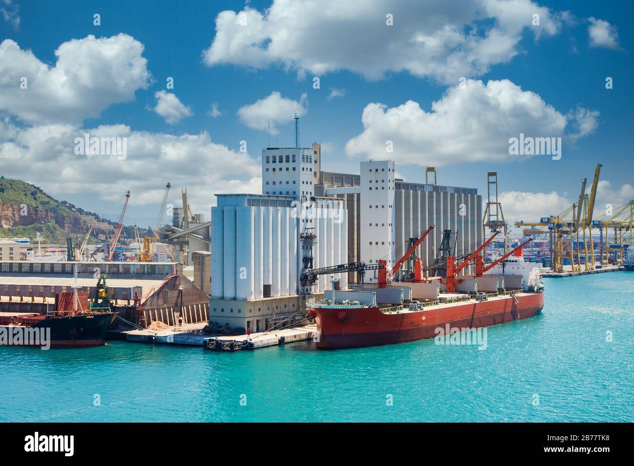Rust Colored Frieghter at Huge Industrial Port Stock Photo - Alamy