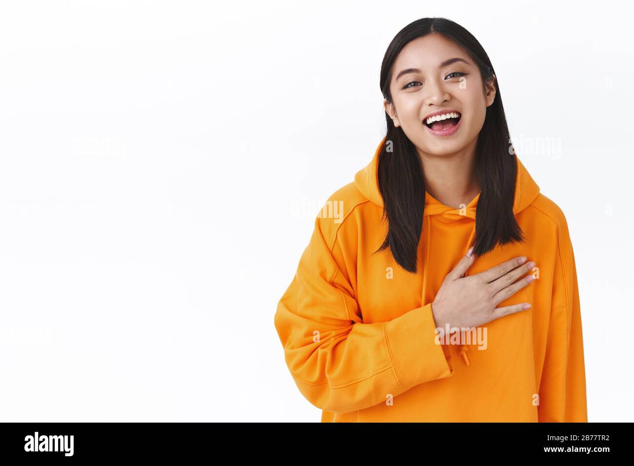 Close-up portrait humble cute asian girl being praised, receive ...