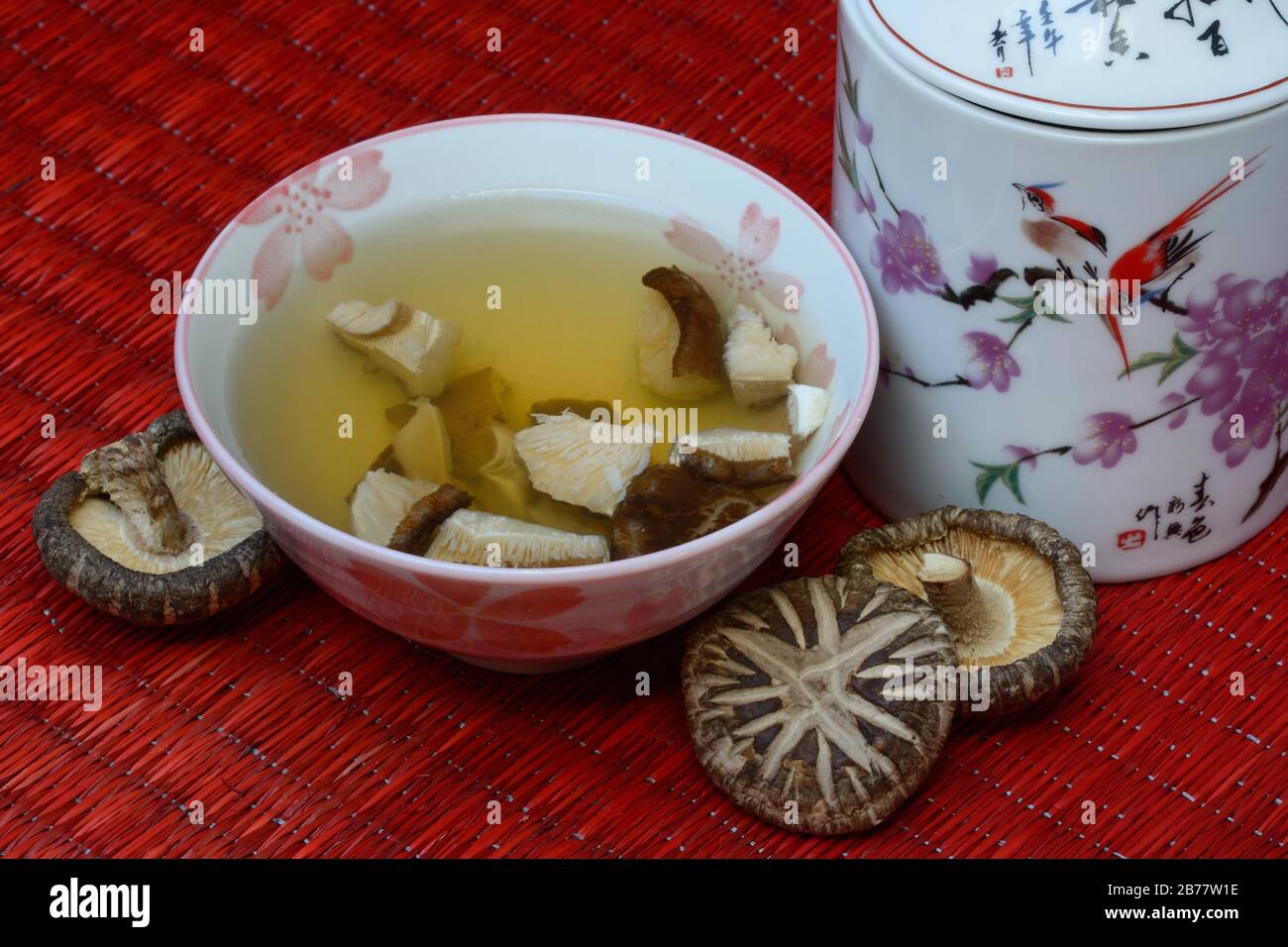 Shiitake tea in bowl and shiitake mushrooms, Germany Stock Photo - Alamy