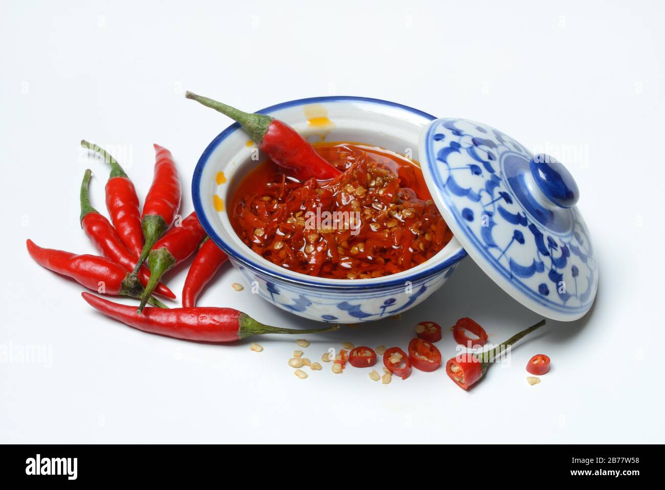 Crushed chilli peppers in oil in shell, Germany Stock Photo - Alamy