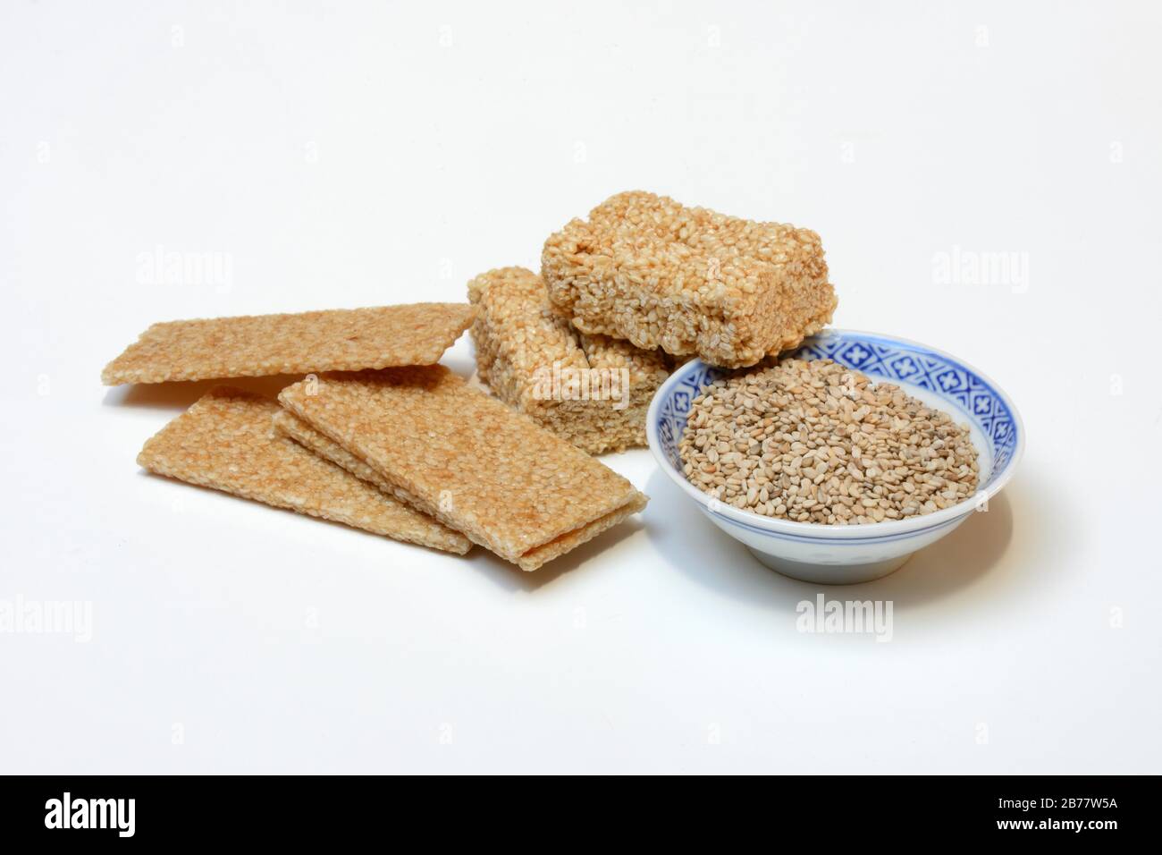 Sesame bar and bowl with white sesame seeds, Germany Stock Photo - Alamy