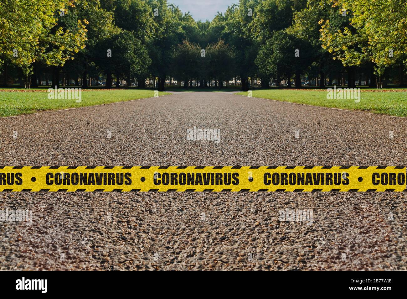Parks lockdown concept: an empty park bordered by a yellow and black ...