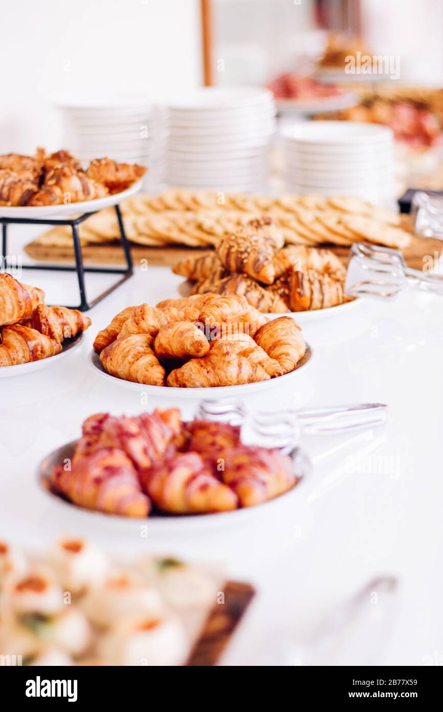 Pastry buffet served at charity event, sweet food and dessert table ...