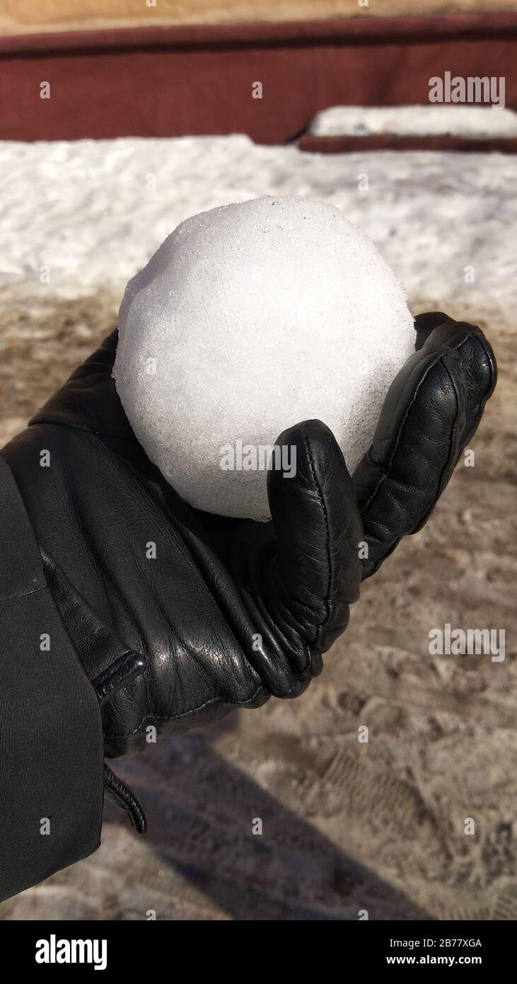 Snowball hand glove hi-res stock photography and images - Alamy