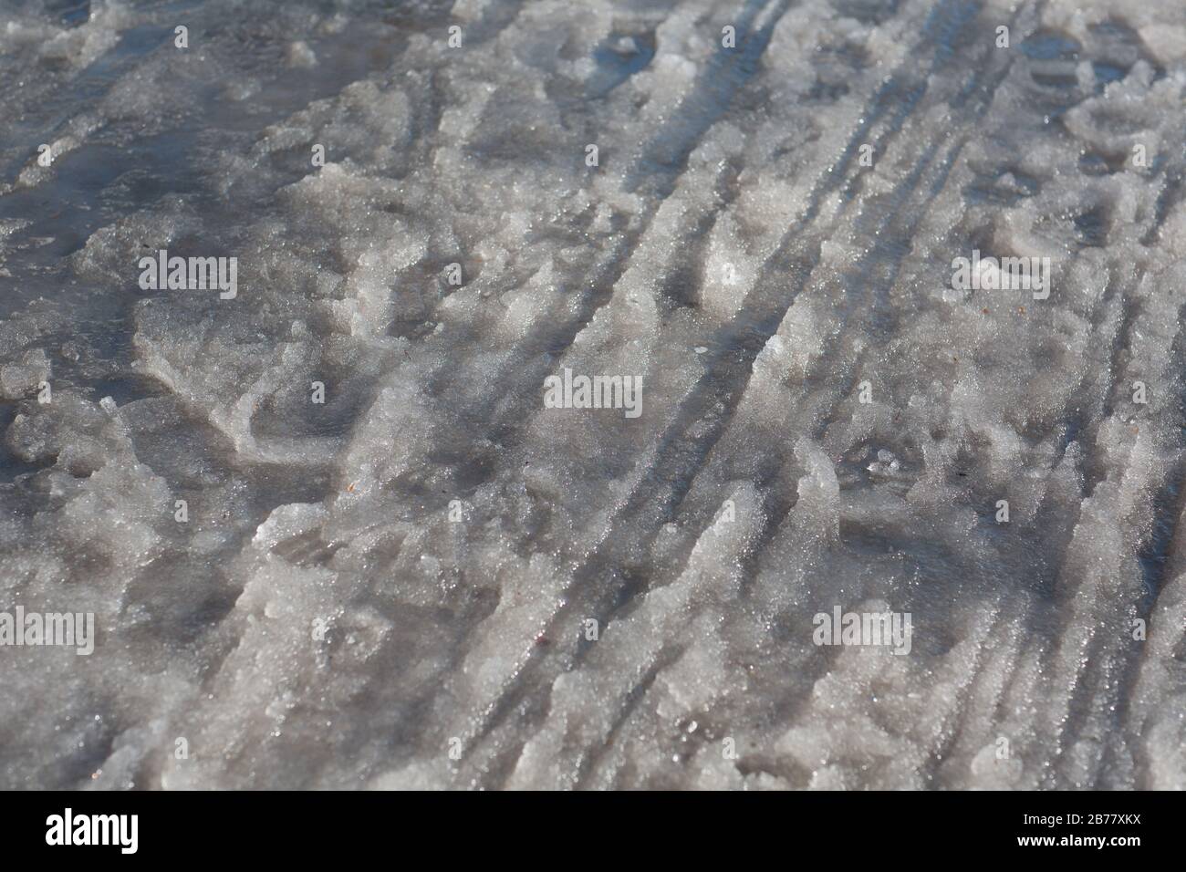 Spring puddles, snowdrifts, snow, mud and melted dirty water Stock ...