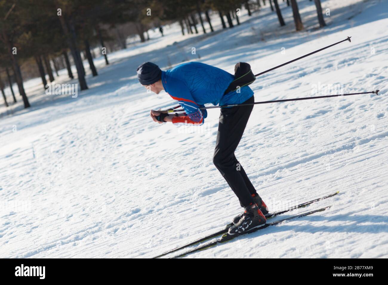 Skier rides on the skiing track on ski Stock Photo - Alamy