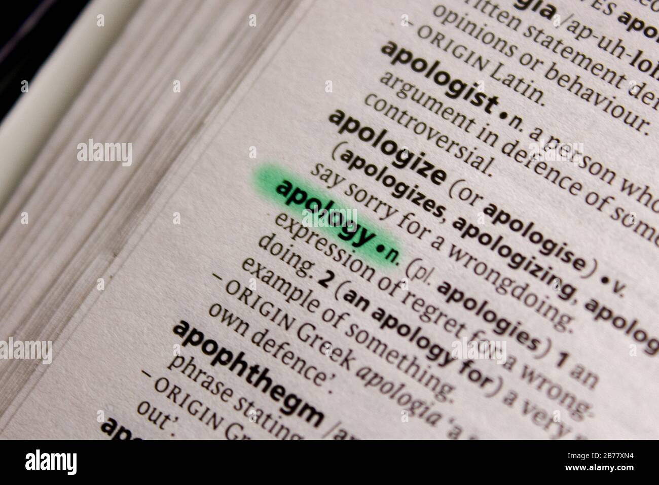 Apology word or phrase in a dictionary Stock Photo - Alamy