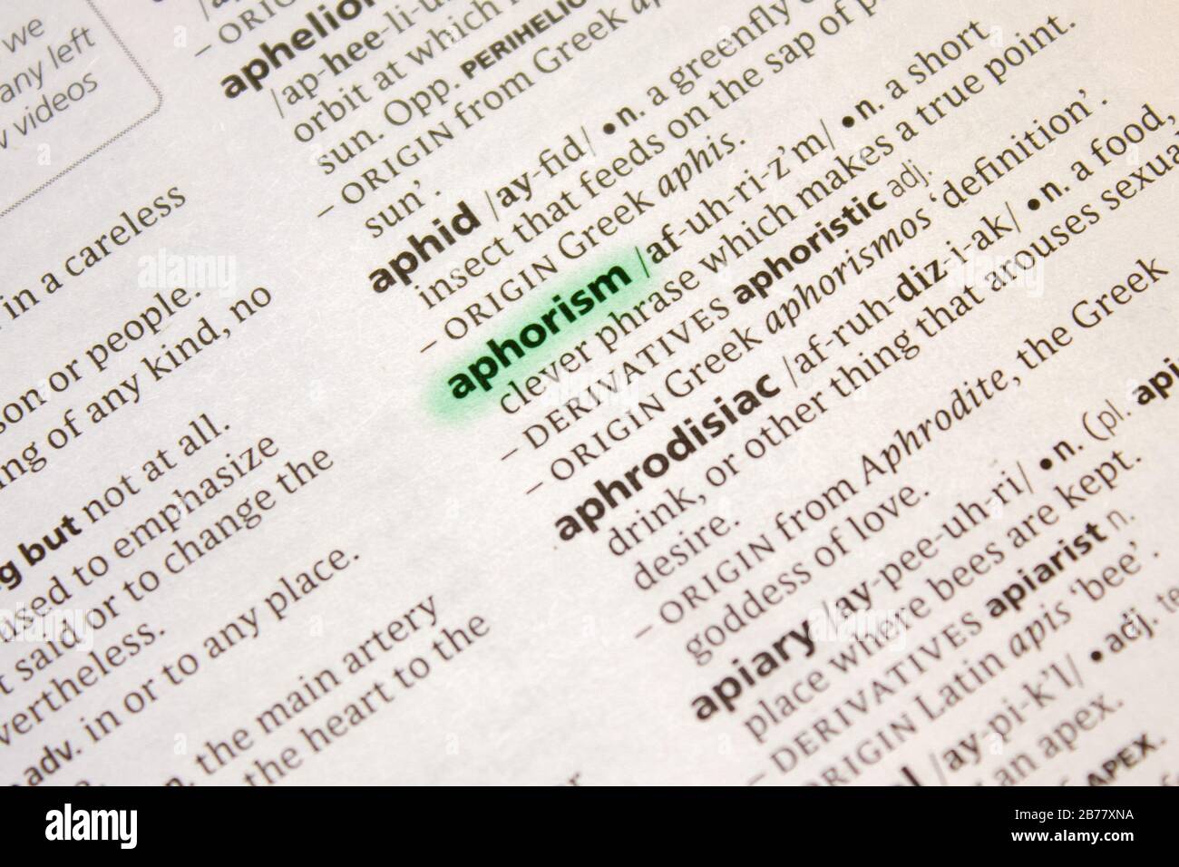 Aphorism word or phrase in a dictionary Stock Photo - Alamy
