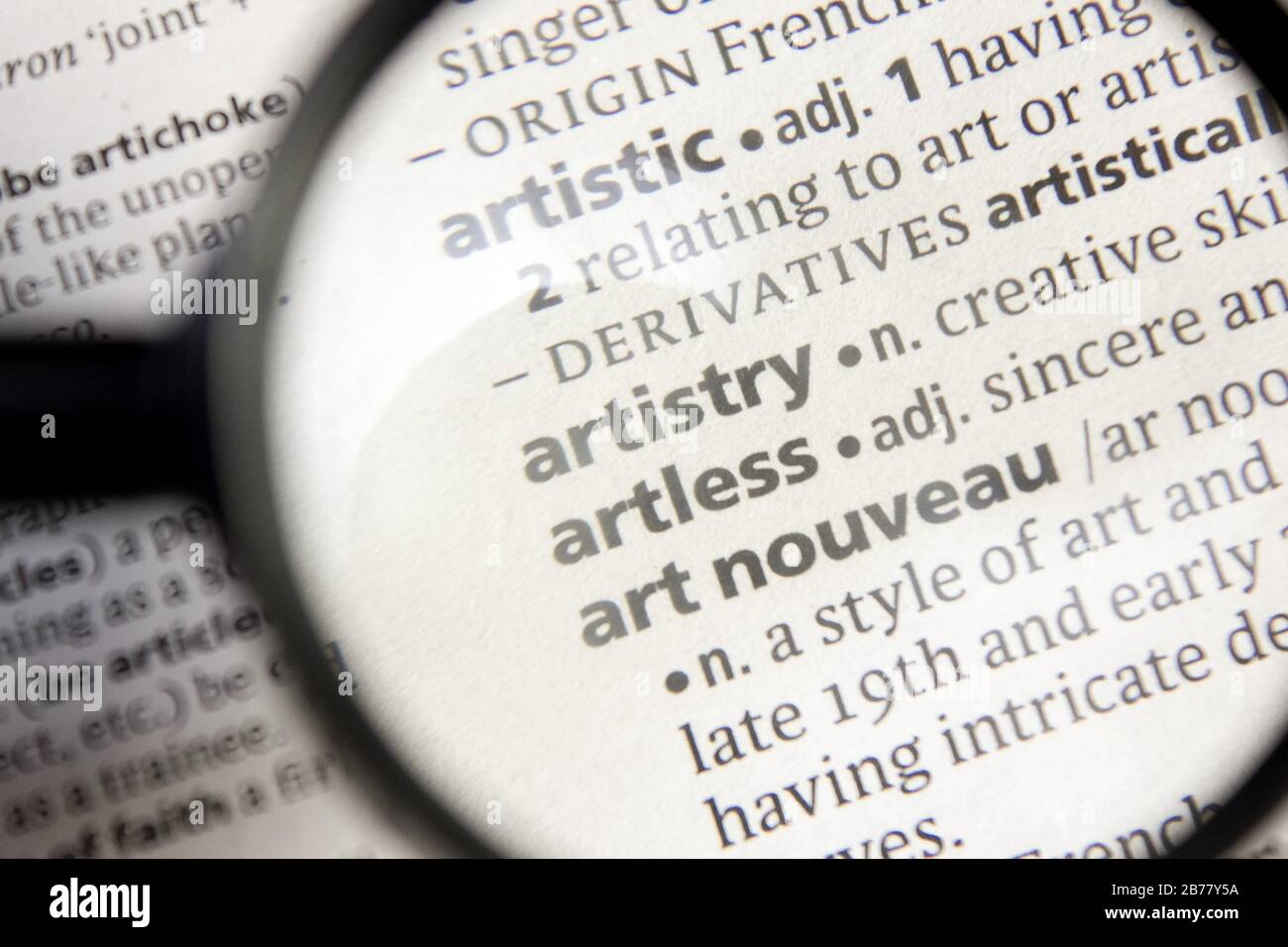 Artistry, artless and art nouveau word or phrase in a dictionary Stock ...