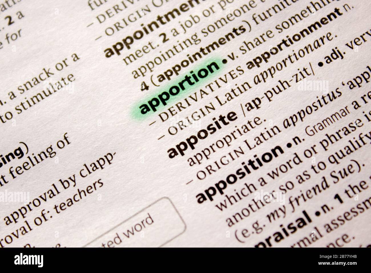 Apportion word or phrase in a dictionary Stock Photo - Alamy