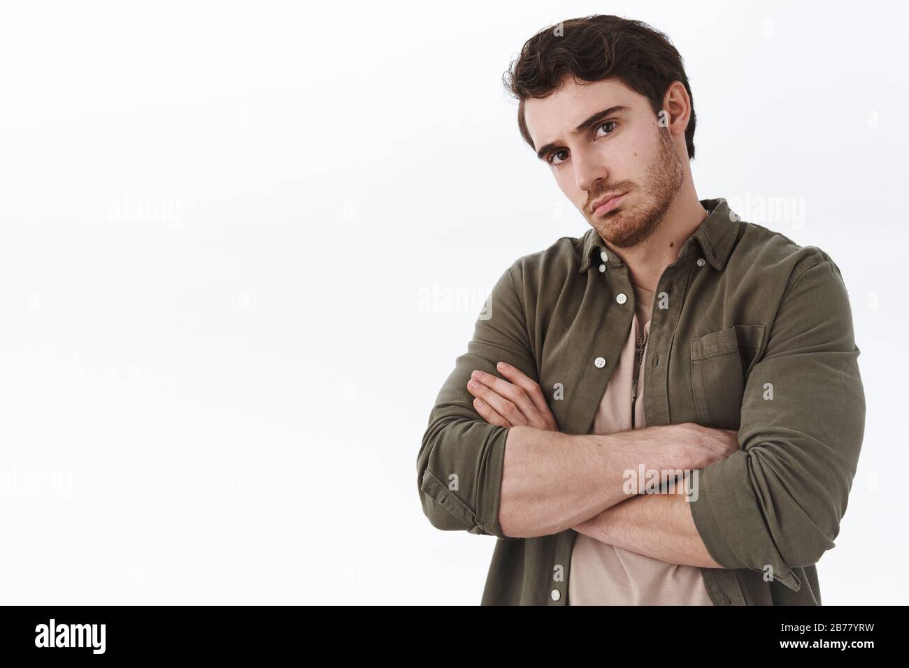 Skeptical and indecisive man facing difficult choice, looking hesitant ...