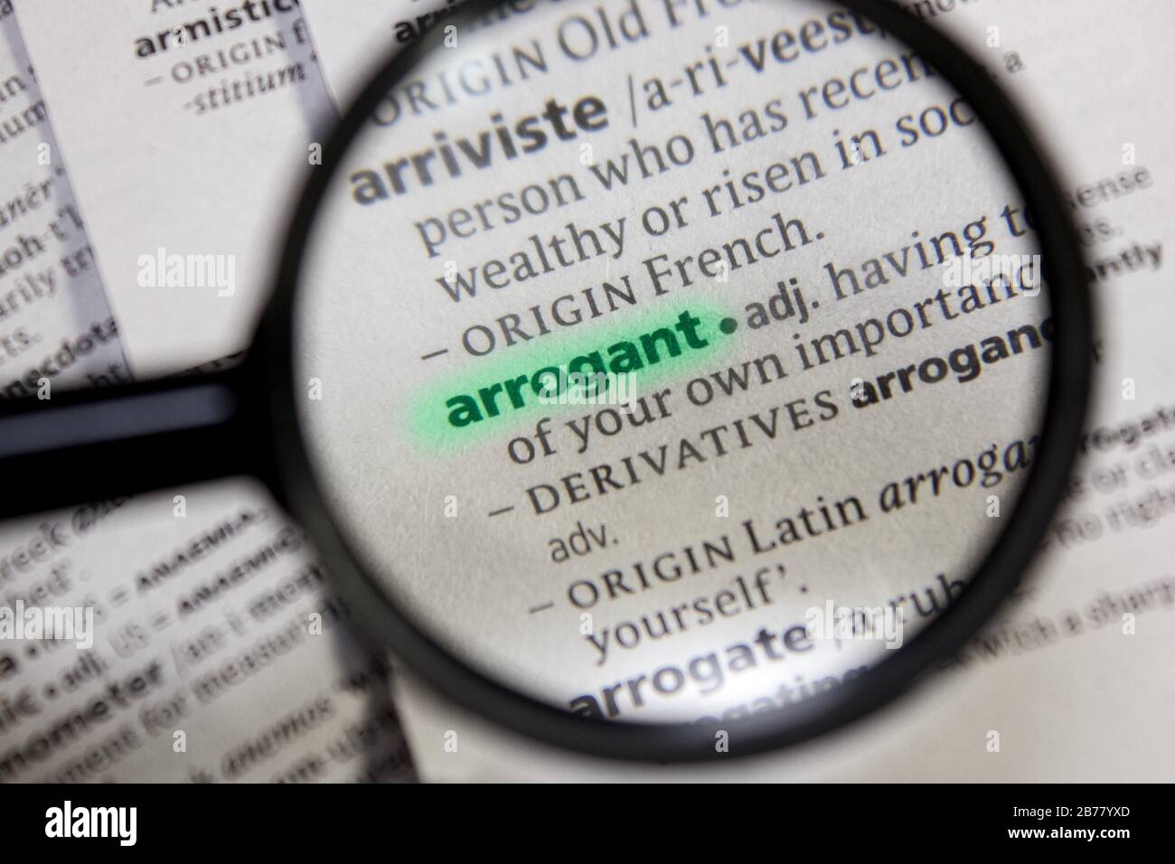 Arrogant word or phrase in a dictionary Stock Photo - Alamy