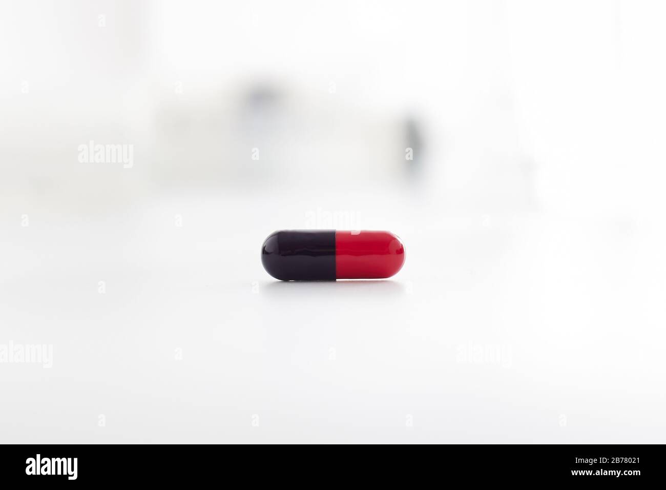 Close up medical pills on blur background Stock Photo - Alamy