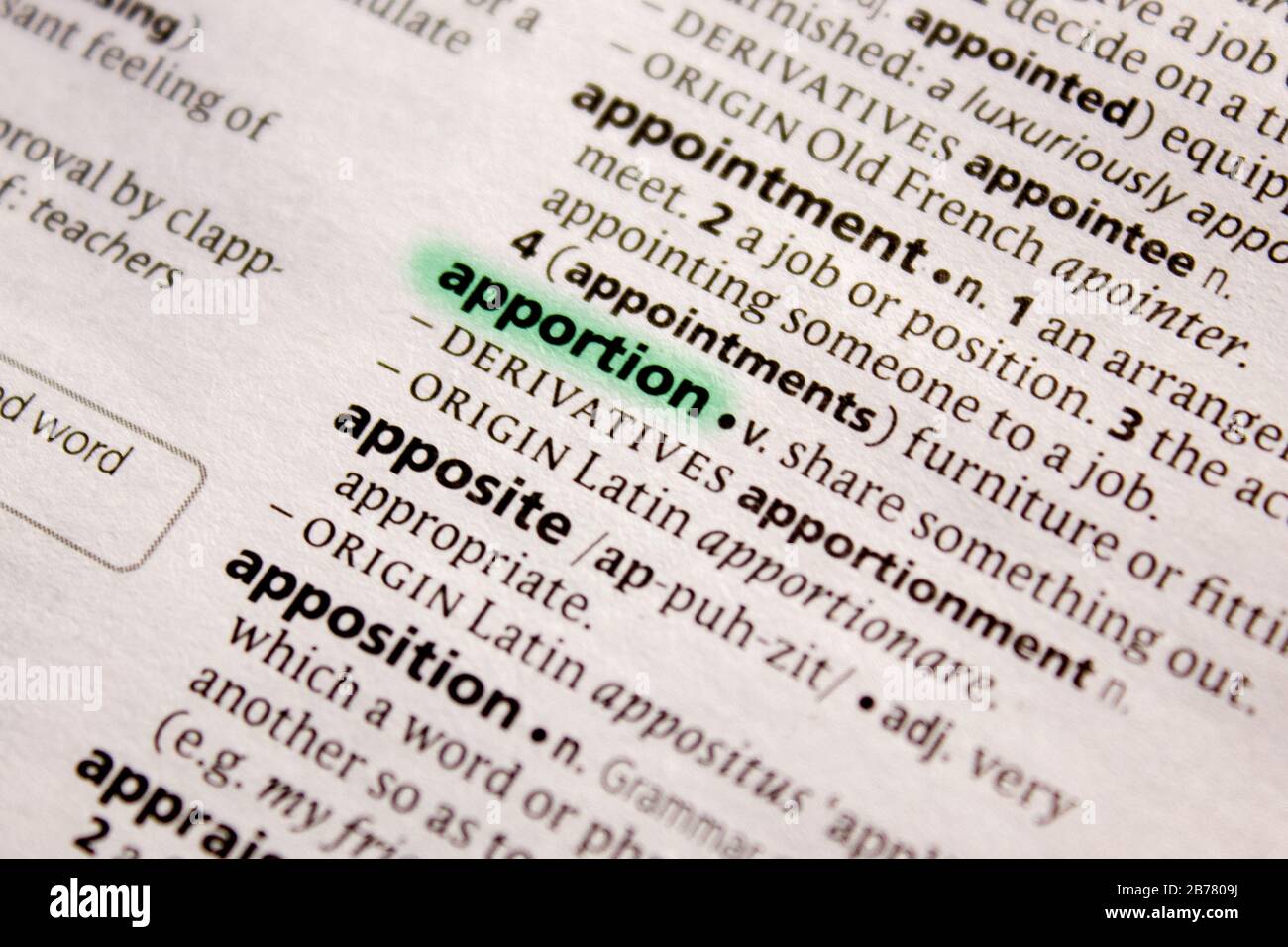 Apportion word or phrase in a dictionary Stock Photo - Alamy
