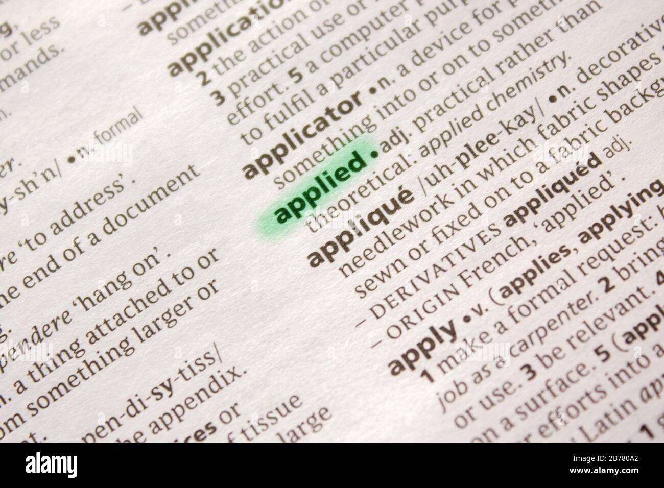 Applied word or phrase in a dictionary Stock Photo - Alamy